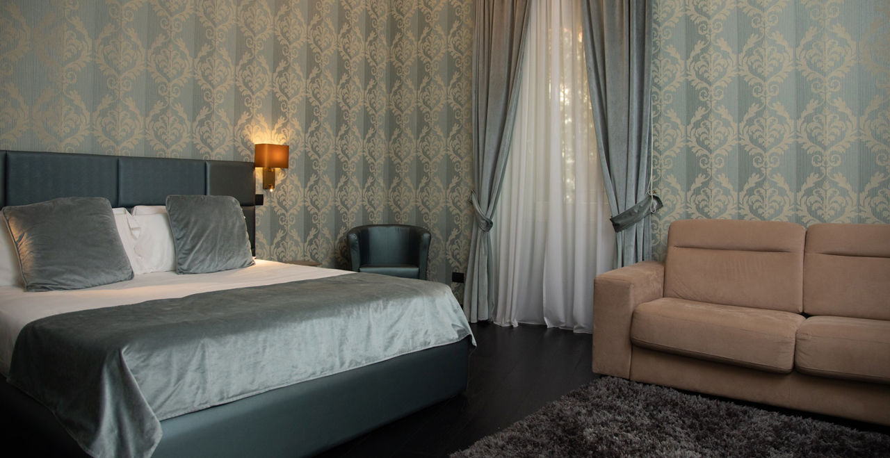Discover the Deluxe rooms of Via Veneto Suites in Rome