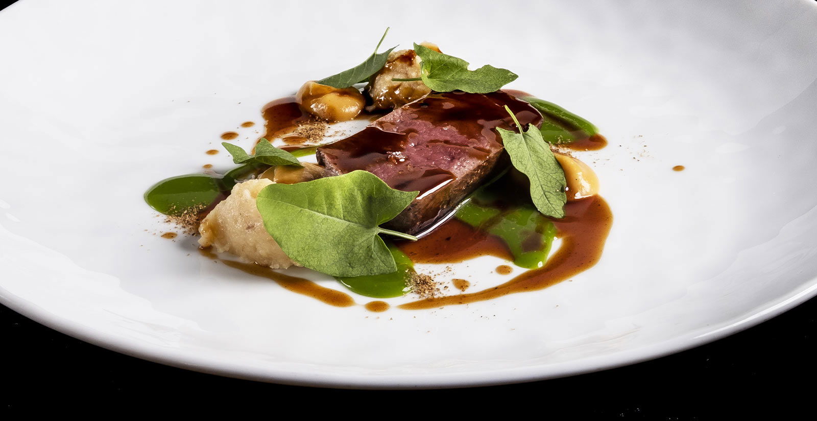 Try the Gourmet restaurants of Castel Monastero, near Siena